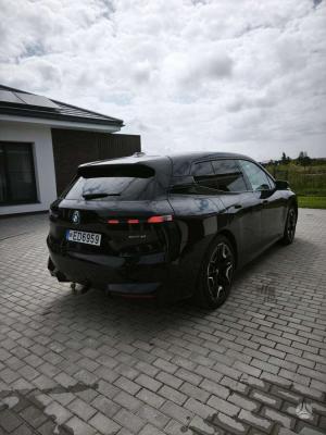 Black BMW iX 2023 in Kaunas, with an engine capacity of 0.00 L and mileage of 59 thousand km for 42000 €, photo 7 on AUTOMOTO.COM.LV