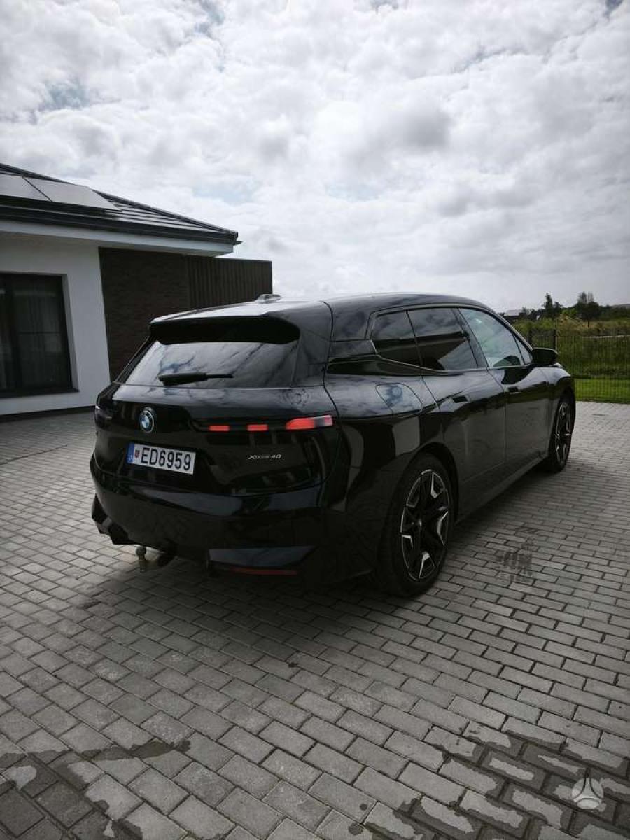 Black BMW iX 2023 in Kaunas, with an engine capacity of 0.00 L and mileage of 59 thousand km for 42000 €, photo 7 on AUTOMOTO.COM.LV