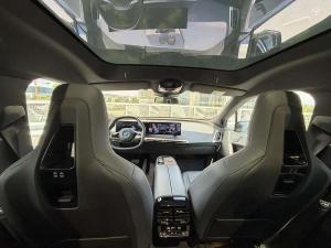Black BMW iX 2023 in Vilnius, with an engine capacity of 0.00 L and mileage of 63 thousand km for 45900 €, photo 20 on AUTOMOTO.COM.LV