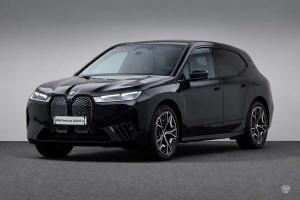 Melns BMW iX 2023 Tukums, ar dzinēja tilpumu 0.00 L un nobraukumu 33 tūkst. km par 51990 €, foto  vietnē AUTOMOTO.COM.LV