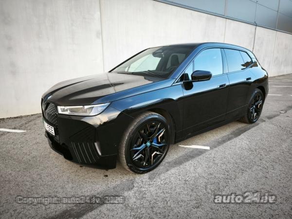 Black BMW iX 2023 in Tallinn, with an engine capacity of 0.00 L and mileage of 59 thousand km for 52900 €, photo 1 on AUTOMOTO.COM.LV