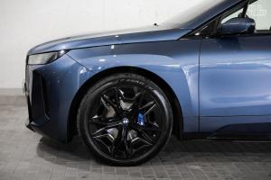 Blue BMW iX 2025 in Vilnius, with an engine capacity of 0.00 L and mileage of 37 thousand km for 81991 €, photo 7 on AUTOMOTO.COM.LV