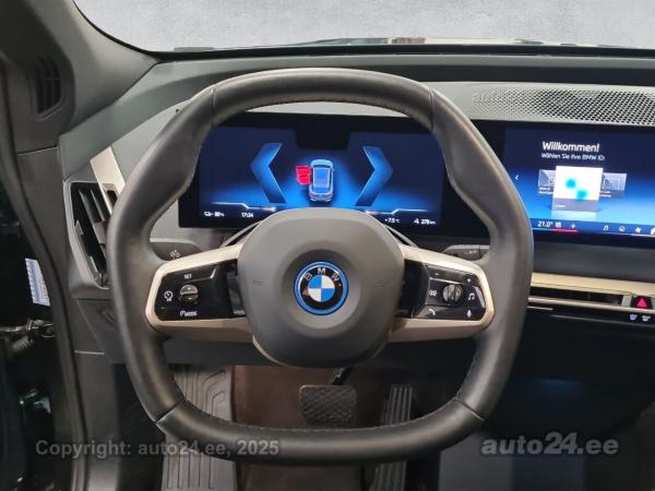 Zils BMW iX 2024 Jehvi, ar dzinēja tilpumu 0.00 L un nobraukumu 12 tūkst. km par 62900 €, foto 8 vietnē AUTOMOTO.COM.LV
