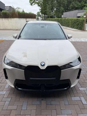 Brown BMW iX 2025 in Kaunas, with an engine capacity of 0.00 L and mileage of 26 thousand km for 63500 €, photo  on AUTOMOTO.COM.LV