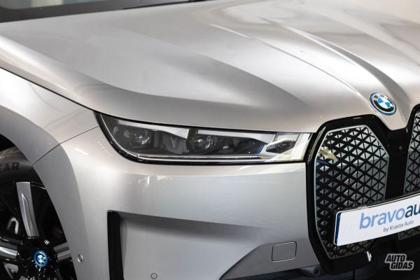 Grey BMW iX 2024 in Vilnius, with an engine capacity of 0.00 L and mileage of 59 thousand km for 59950 €, photo 5 on AUTOMOTO.COM.LV