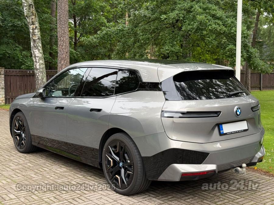 Grey BMW iX 2025 in Tallinn, with an engine capacity of 0.00 L and mileage of 18 thousand km for 77980 €, photo 4 on AUTOMOTO.COM.LV