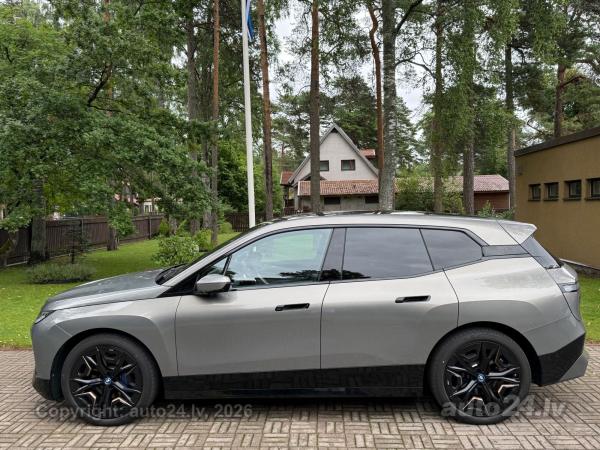 Grey BMW iX 2025 in Tallinn, with an engine capacity of 0.00 L and mileage of 18 thousand km for 77980 €, photo 6 on AUTOMOTO.COM.LV