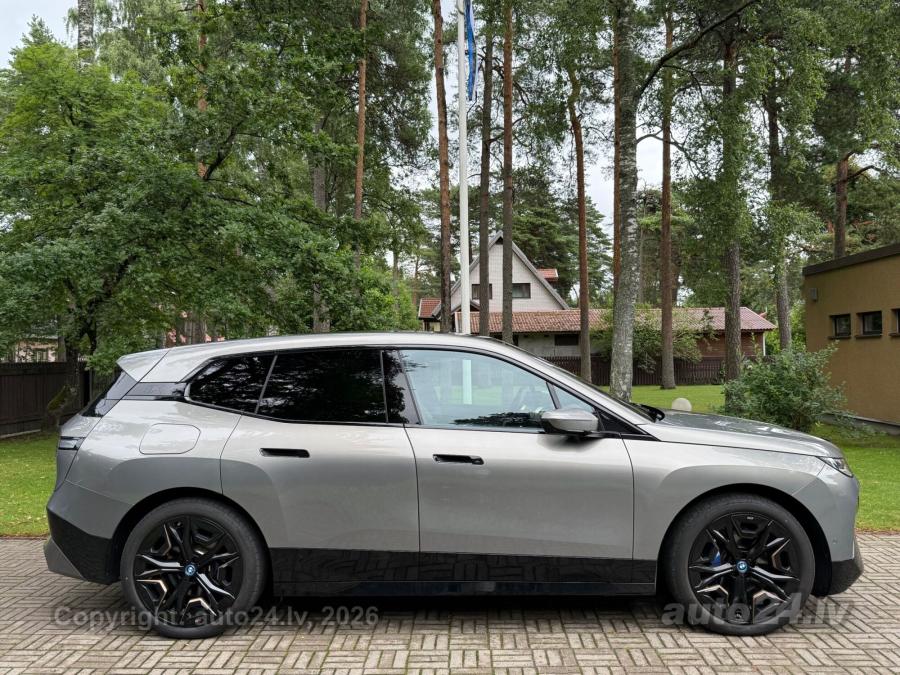 Grey BMW iX 2025 in Tallinn, with an engine capacity of 0.00 L and mileage of 18 thousand km for 77980 €, photo 8 on AUTOMOTO.COM.LV