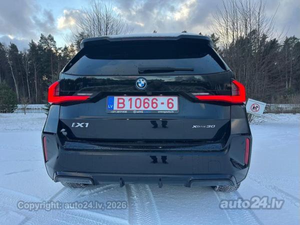 Melns BMW iX1 2023 Rīga, ar dzinēja tilpumu 0.00 L un nobraukumu 41 tūkst. km par 37580 €, foto 6 vietnē AUTOMOTO.COM.LV