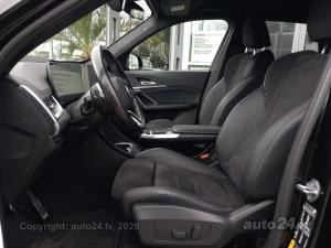 Melns BMW iX1 2023 Rīga, ar dzinēja tilpumu 0.00 L un nobraukumu 41 tūkst. km par 37580 €, foto 18 vietnē AUTOMOTO.COM.LV