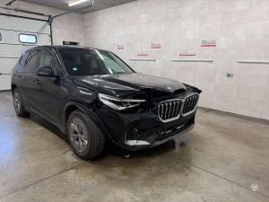 Melns BMW iX1 2023 Marijampole, ar dzinēja tilpumu 0.00 L un nobraukumu 86 tūkst. km par 18997 €, foto  vietnē AUTOMOTO.COM.LV