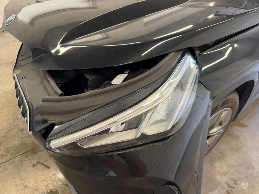 Melns BMW iX1 2023 Marijampole, ar dzinēja tilpumu 0.00 L un nobraukumu 86 tūkst. km par 18997 €, foto 17 vietnē AUTOMOTO.COM.LV