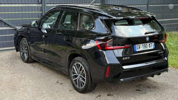 Black BMW iX1 2024 in Jonava, with an engine capacity of 0.00 L and mileage of 42 thousand km for 23850 €, photo 1 on AUTOMOTO.COM.LV