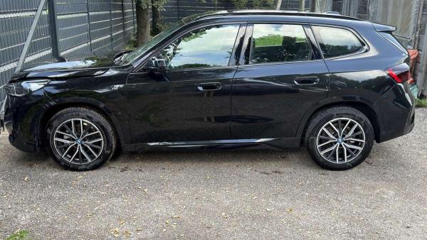 Black BMW iX1 2024 in Jonava, with an engine capacity of 0.00 L and mileage of 42 thousand km for 23850 €, photo 8 on AUTOMOTO.COM.LV