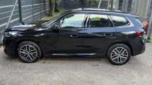 Black BMW iX1 2024 in Jonava, with an engine capacity of 0.00 L and mileage of 43 thousand km for 23600 €, photo 5 on AUTOMOTO.COM.LV