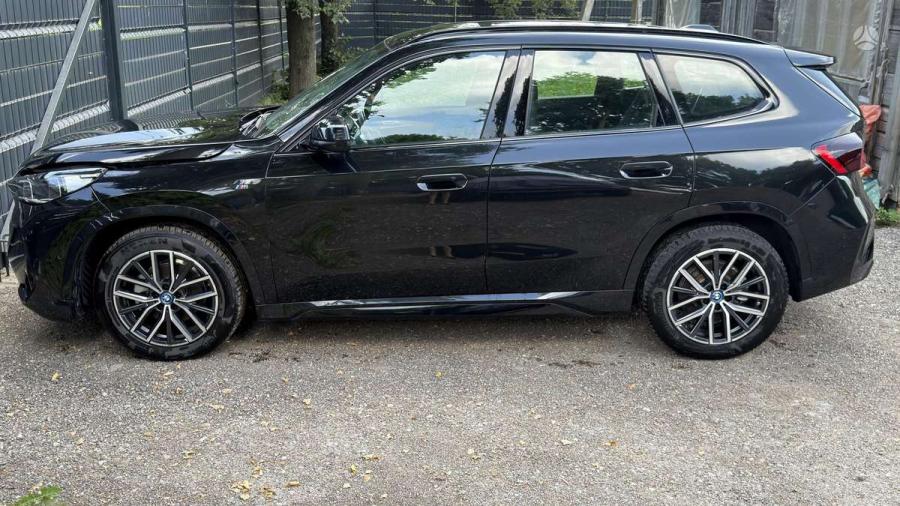 Black BMW iX1 2024 in Jonava, with an engine capacity of 0.00 L and mileage of 43 thousand km for 23600 €, photo 13 on AUTOMOTO.COM.LV