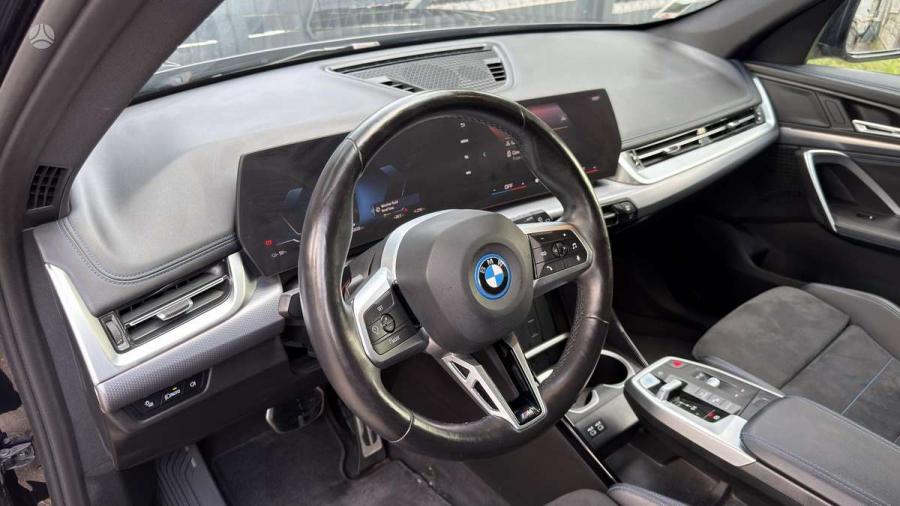 Black BMW iX1 2024 in Jonava, with an engine capacity of 0.00 L and mileage of 43 thousand km for 23600 €, photo 22 on AUTOMOTO.COM.LV
