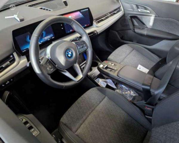 Black BMW iX1 2025 in Siauliai, with an engine capacity of 0.00 L and mileage of 8 thousand km for 28900 €, photo 5 on AUTOMOTO.COM.LV