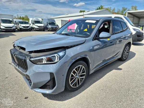 Синий БМВ iX1 2023 в Шяуляй, объемом двигателя 0.00 л и пробегом 97 тыс. км за 18990 €, фото 3 на AUTOMOTO.COM.LV