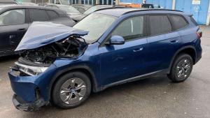 Blue BMW iX1 2024 in Kaunas, with an engine capacity of 0.00 L and mileage of 16 thousand km for 10999 €, photo  on AUTOMOTO.COM.LV