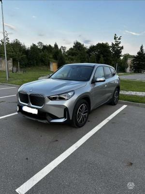 Grey BMW iX1 2024 in Kaunas, with an engine capacity of 0.00 L and mileage of 25 thousand km for 34990 €, photo  on AUTOMOTO.COM.LV