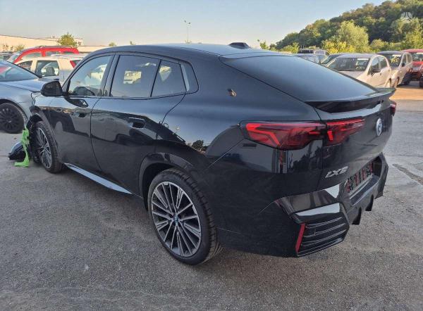 Black BMW iX2 2025 in Klaipeda, with an engine capacity of 0.00 L and mileage of 32 thousand km for 12600 €, photo 3 on AUTOMOTO.COM.LV
