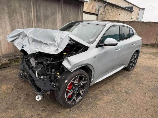 Grey BMW iX2 2024 in Gargzdai, with an engine capacity of 0.00 L and mileage of 10 thousand km for 15200 €, photo 1 on AUTOMOTO.COM.LV