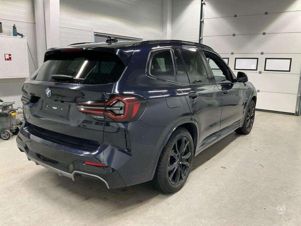 Black BMW iX3 2022 in Vilnius, with an engine capacity of 0.00 L and mileage of 145 thousand km for 34700 €, photo 2 on AUTOMOTO.COM.LV