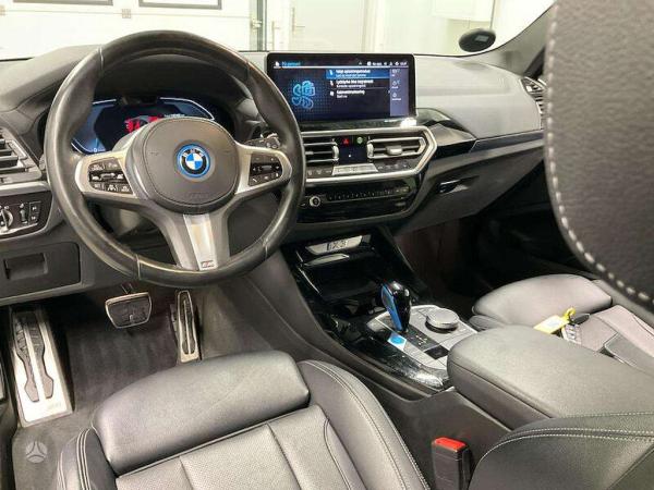 Black BMW iX3 2022 in Vilnius, with an engine capacity of 0.00 L and mileage of 145 thousand km for 34700 €, photo 6 on AUTOMOTO.COM.LV