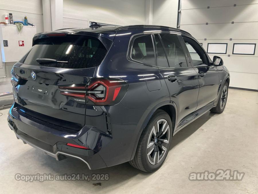 Black BMW iX3 2022 in Tartu, with an engine capacity of 0.00 L and mileage of 111 thousand km for 38900 €, photo 5 on AUTOMOTO.COM.LV