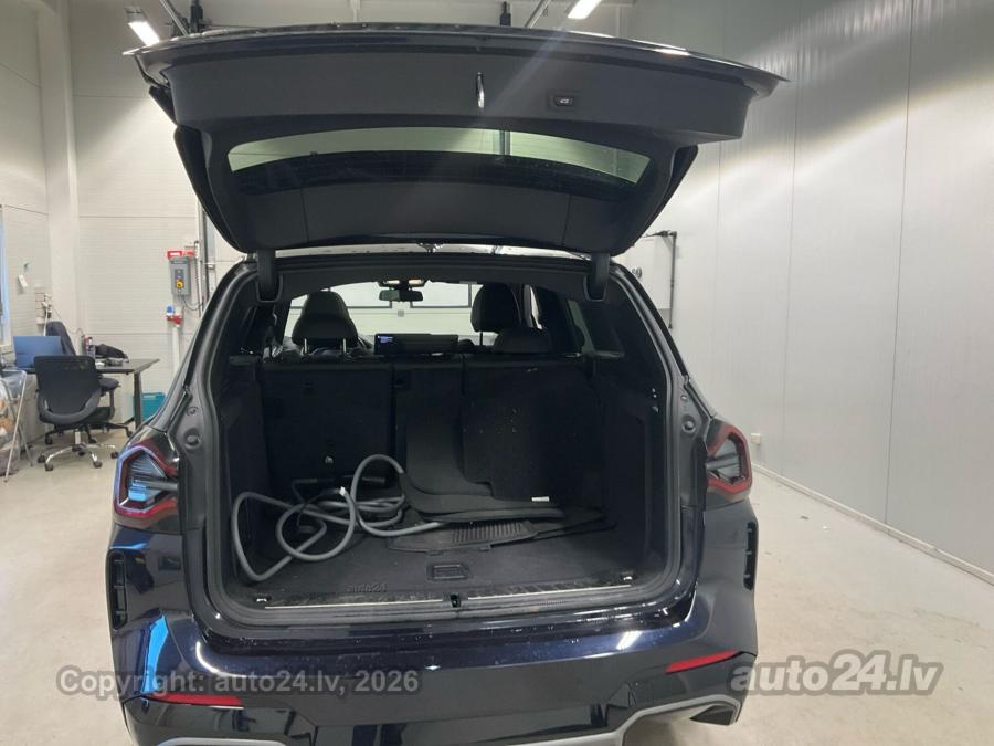 Black BMW iX3 2022 in Tartu, with an engine capacity of 0.00 L and mileage of 111 thousand km for 38900 €, photo 12 on AUTOMOTO.COM.LV