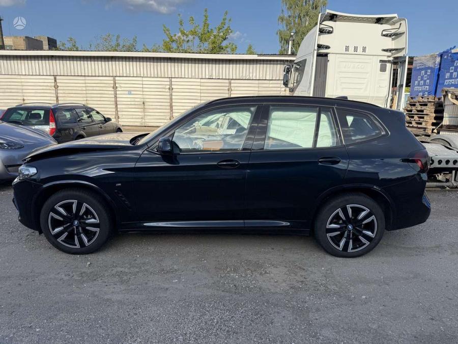 Blue BMW iX3 2023 in Kaunas, with an engine capacity of 0.00 L and mileage of 55 thousand km for 22490 €, photo 8 on AUTOMOTO.COM.LV
