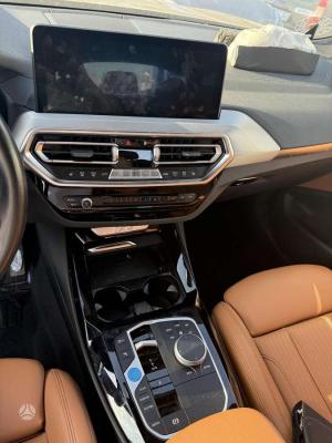 Blue BMW iX3 2023 in Kaunas, with an engine capacity of 0.00 L and mileage of 55 thousand km for 22490 €, photo 18 on AUTOMOTO.COM.LV