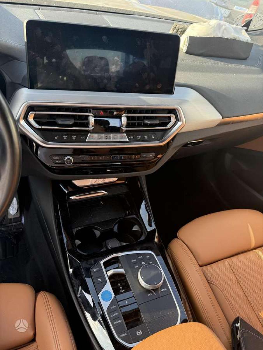 Blue BMW iX3 2023 in Kaunas, with an engine capacity of 0.00 L and mileage of 55 thousand km for 22490 €, photo 18 on AUTOMOTO.COM.LV