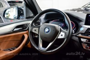 Blue BMW iX3 2021 in Tallinn, with an engine capacity of 0.00 L and mileage of 74 thousand km for 39900 €, photo 15 on AUTOMOTO.COM.LV