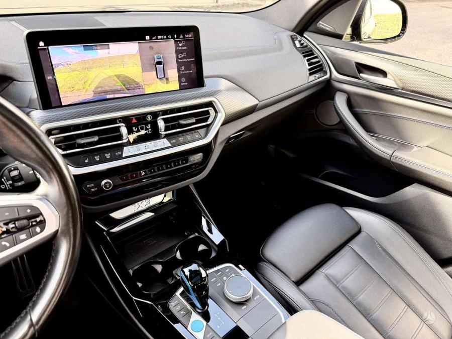 Grey BMW iX3 2022 in Kaunas, with an engine capacity of 0.00 L and mileage of 142 thousand km for 31999 €, photo 15 on AUTOMOTO.COM.LV