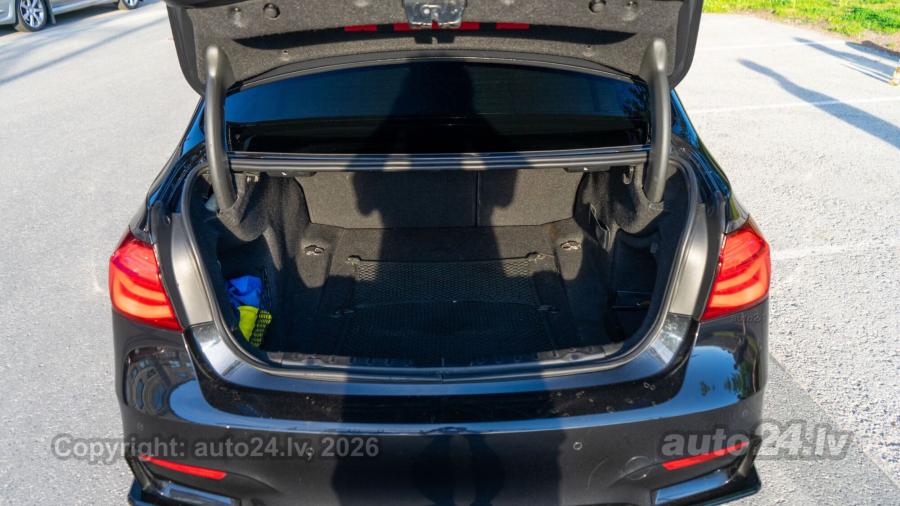 Black BMW M-series 2015 in Tallinn, with an engine capacity of 3.00 L and mileage of 189 thousand km for 42500 €, photo 9 on AUTOMOTO.COM.LV