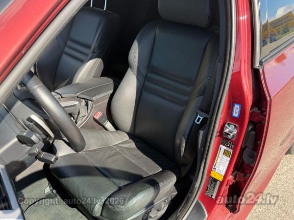 Red BMW M-series 2005 in Tallinn, with an engine capacity of 5.00 L and mileage of 143 thousand km for 27499 €, photo 8 on AUTOMOTO.COM.LV
