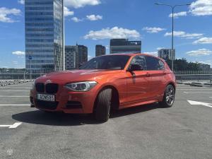Oranžs BMW m135 2014 Viļņa, ar dzinēja tilpumu 2.98 L un nobraukumu 165 tūkst. km par 16000 €, foto  vietnē AUTOMOTO.COM.LV