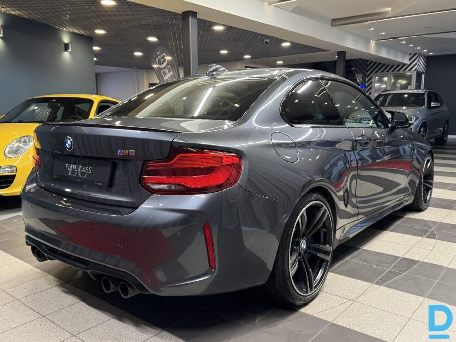Grey BMW M2 2017 in Marupe, with an engine capacity of 3.00 L and mileage of 141 thousand km for 32990 €, photo 2 on AUTOMOTO.COM.LV