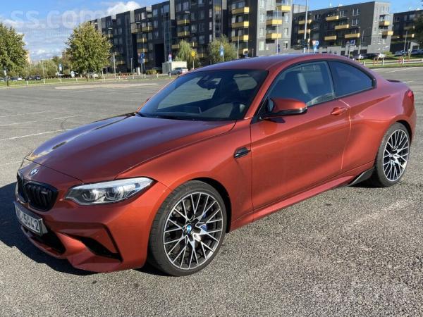 Orange BMW M2 2018 in Riga, with an engine capacity of 3.00 L and mileage of 95 thousand km for 41000 €, photo 1 on AUTOMOTO.COM.LV