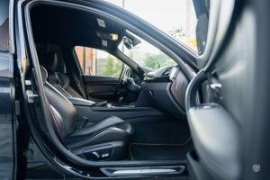 Black BMW M3 2018 in Vilnius, with an engine capacity of 2.98 L and mileage of 114 thousand km for 45990 €, photo 25 on AUTOMOTO.COM.LV