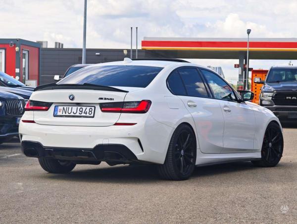 White BMW M340 2021 in Vilnius, with an engine capacity of 3.00 L and mileage of 77 thousand km for 33299 €, photo 3 on AUTOMOTO.COM.LV