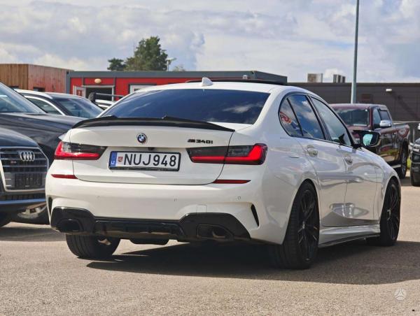 White BMW M340 2021 in Vilnius, with an engine capacity of 3.00 L and mileage of 77 thousand km for 33299 €, photo 9 on AUTOMOTO.COM.LV