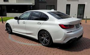 White BMW M340 2022 in Vilnius, with an engine capacity of 3.00 L and mileage of 112 thousand km for 35600 €, photo 5 on AUTOMOTO.COM.LV