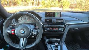 Black BMW M4 2015 in Riga, with an engine capacity of 2.98 L and mileage of 187 thousand km for 36999 €, photo 7 on AUTOMOTO.COM.LV