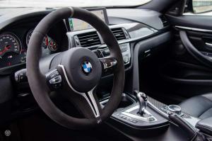 Black BMW M4 2015 in Vilnius, with an engine capacity of 3.00 L and mileage of 70 thousand km for 38000 €, photo 9 on AUTOMOTO.COM.LV