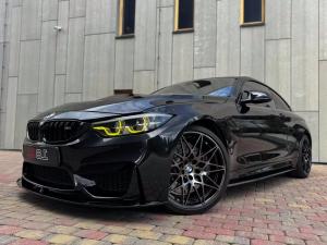 Black BMW M4 2020 in Riga, with an engine capacity of 3.00 L and mileage of 61 thousand km for 54000 €, photo  on AUTOMOTO.COM.LV