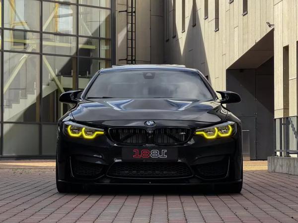 Black BMW M4 2020 in Riga, with an engine capacity of 3.00 L and mileage of 61 thousand km for 54000 €, photo 2 on AUTOMOTO.COM.LV