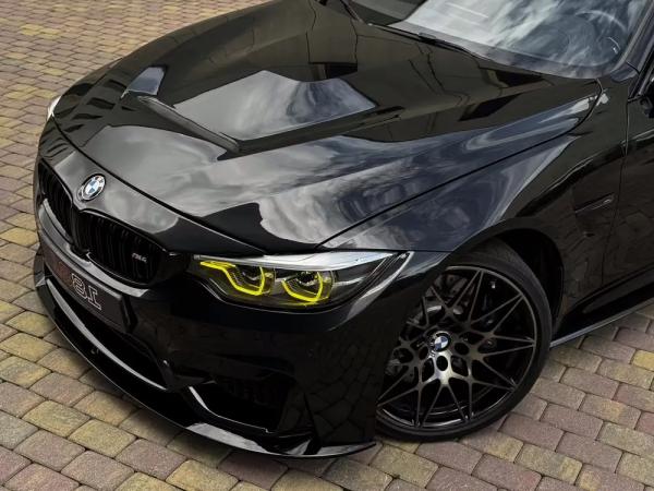 Black BMW M4 2020 in Riga, with an engine capacity of 3.00 L and mileage of 61 thousand km for 54000 €, photo 5 on AUTOMOTO.COM.LV
